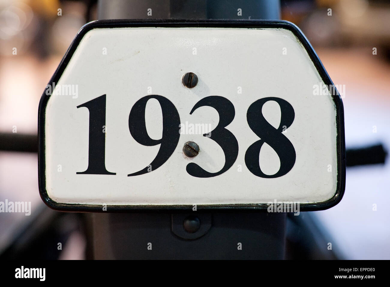 sign plate with big number 1938 digits closeup Stock Photo - Alamy