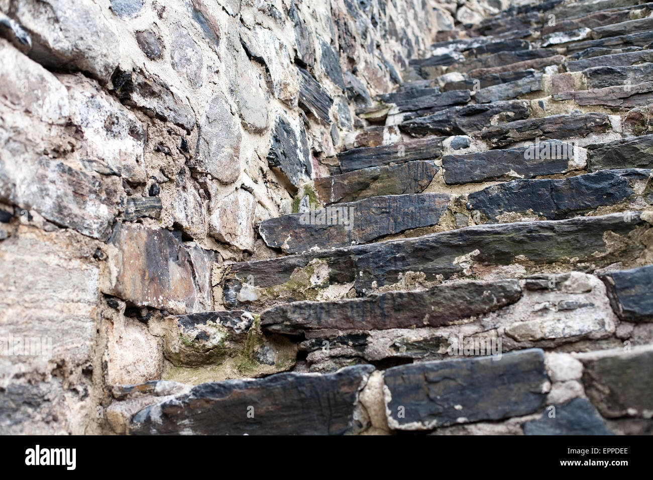 old fortress wall and staircase made from big stones masonry pattern ...