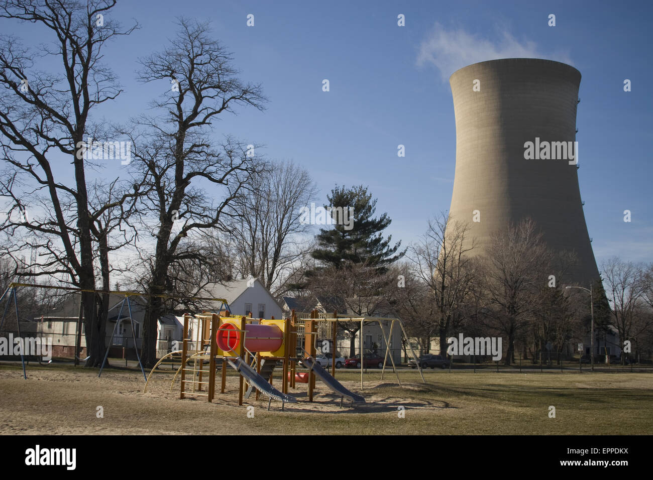 A nuclear silo stretches up into the sky behind an Indiana neighborhood ...