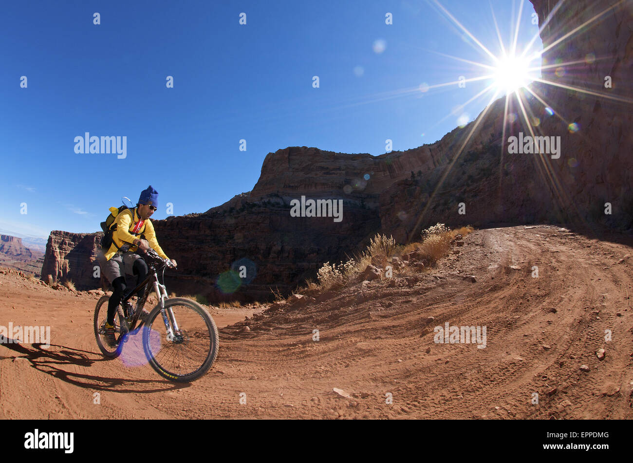 A man mountain biking in the desert Stock Photo - Alamy