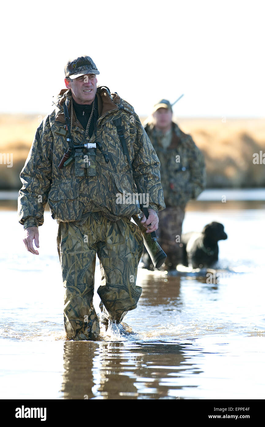 Two hunters wading hi-res stock photography and images - Alamy