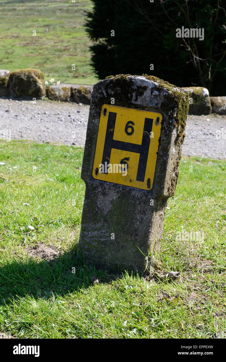 Roadside fire hydrant tombstone and yellow plate Stock Photo - Alamy