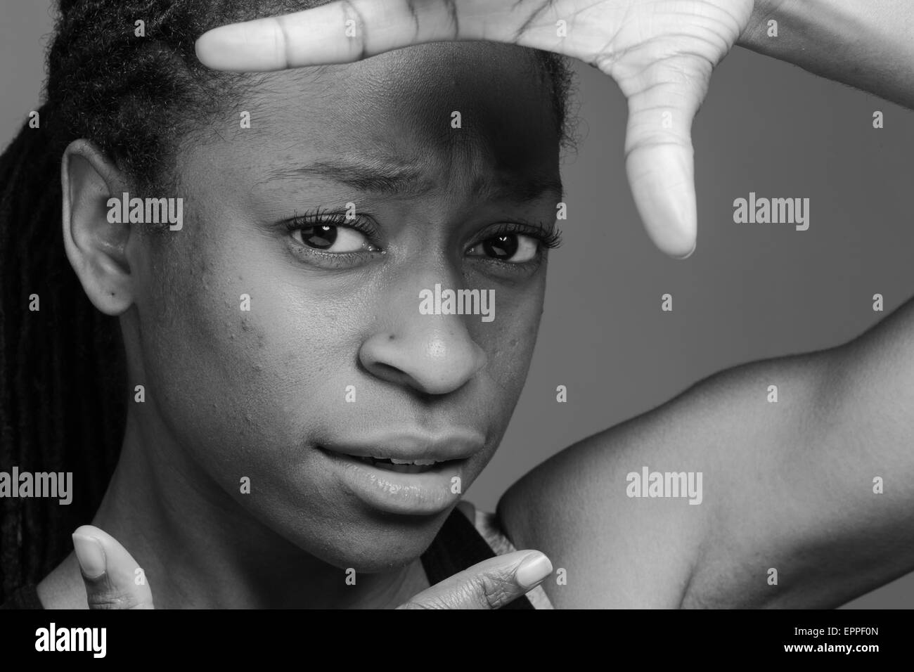 Model isolated framing with fingers Stock Photo - Alamy