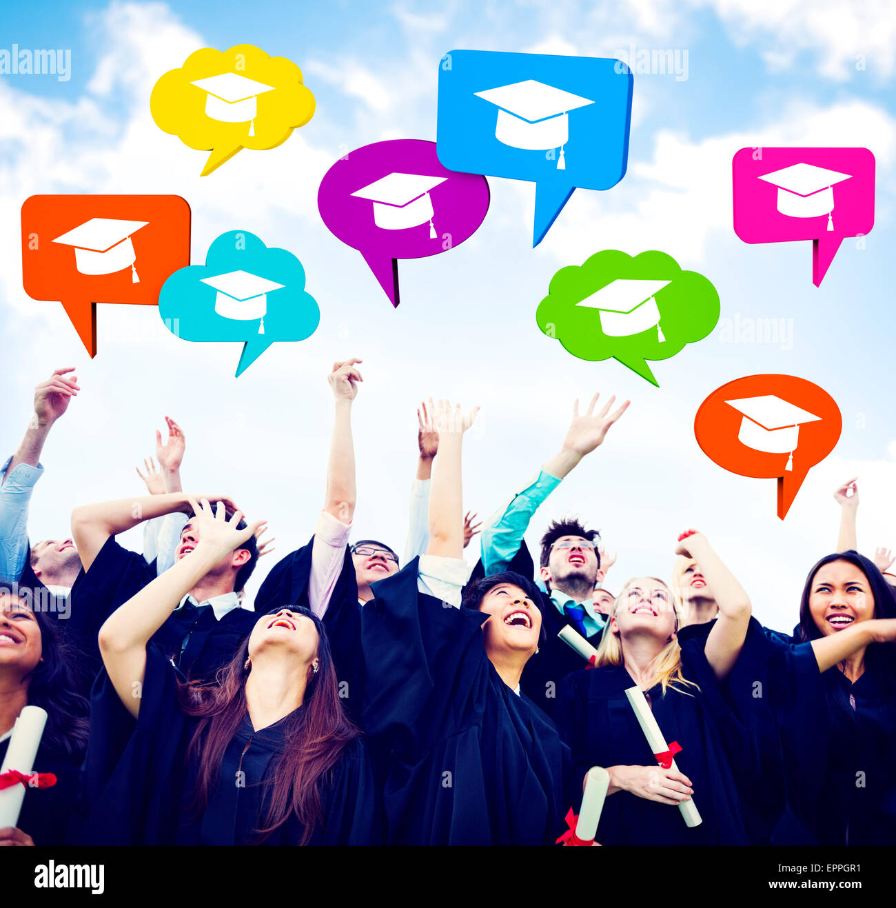 Graduates arms raised with speech bubbles Stock Photo - Alamy