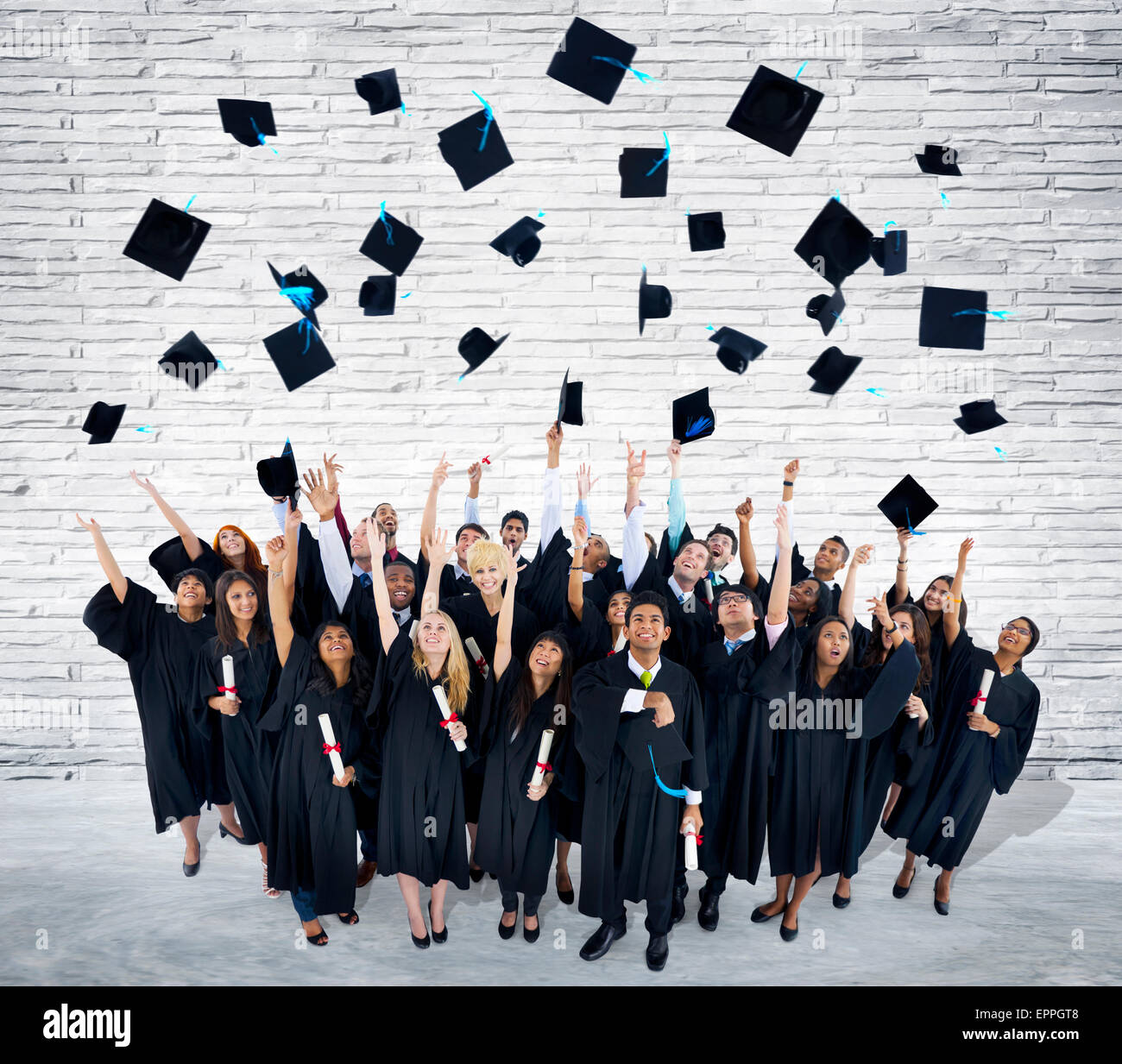 Group of graduating students who are celebrating Stock Photo - Alamy