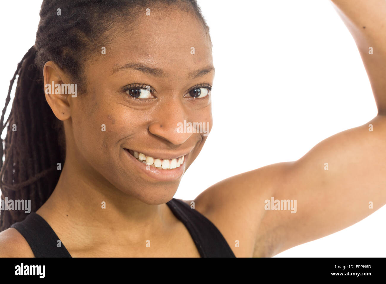 Model isolated on plain background in studio arm curl Stock Photo - Alamy