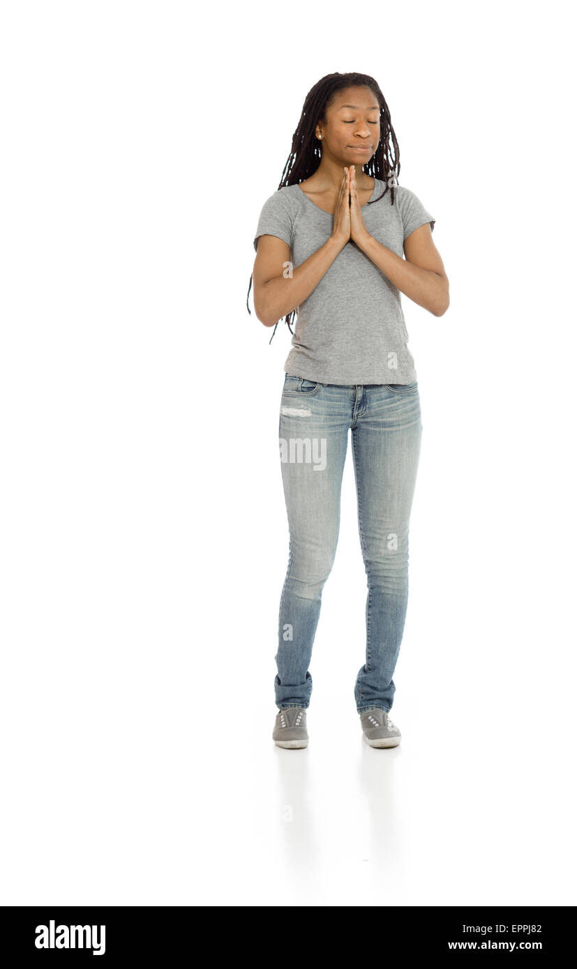 Model isolated on plain background in studio wishing praying Stock ...