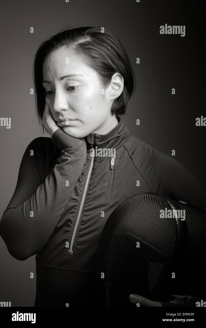 Female fencer looking sad Stock Photo - Alamy