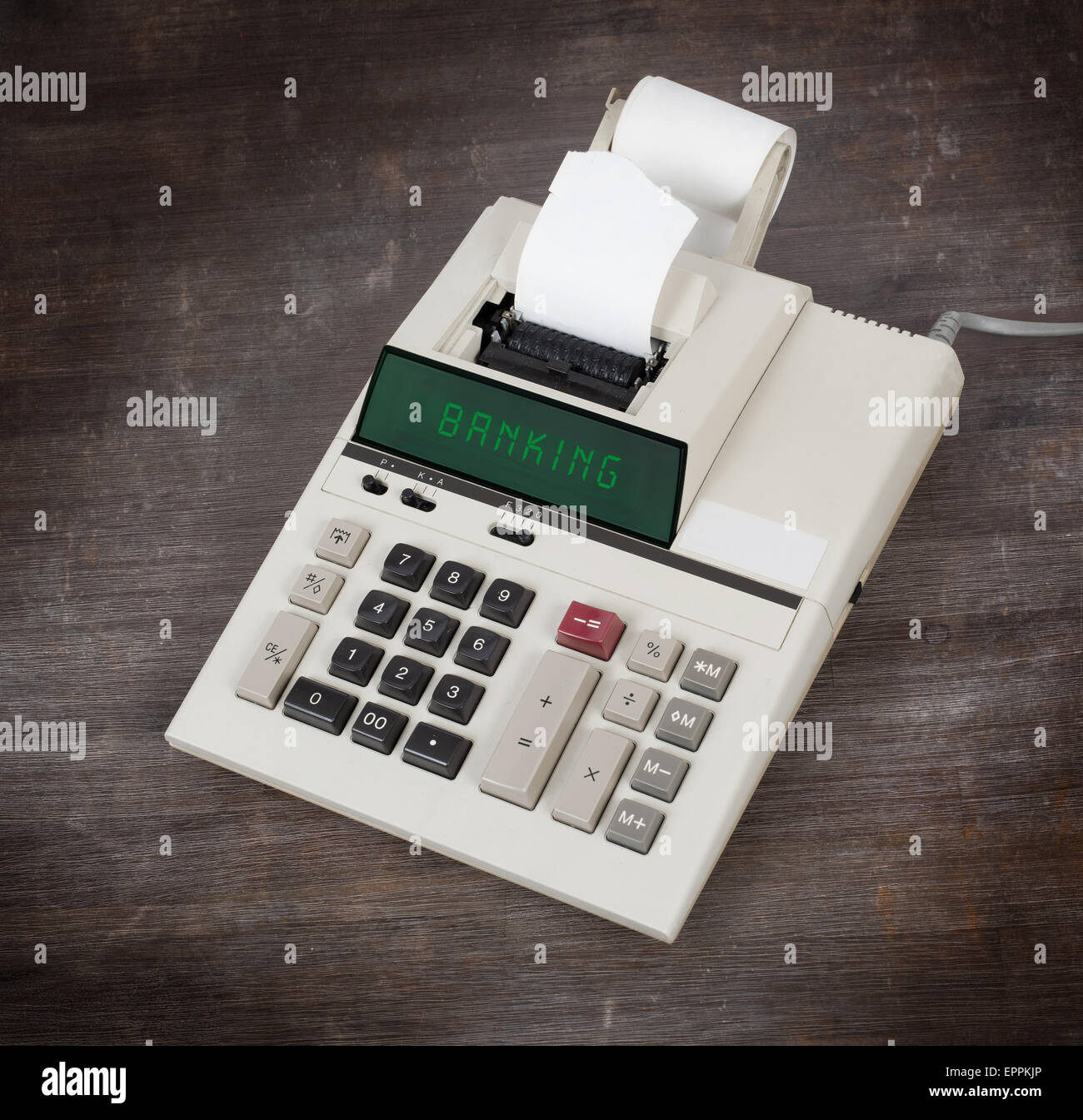Old calculator showing a text on display - banking Stock Photo - Alamy