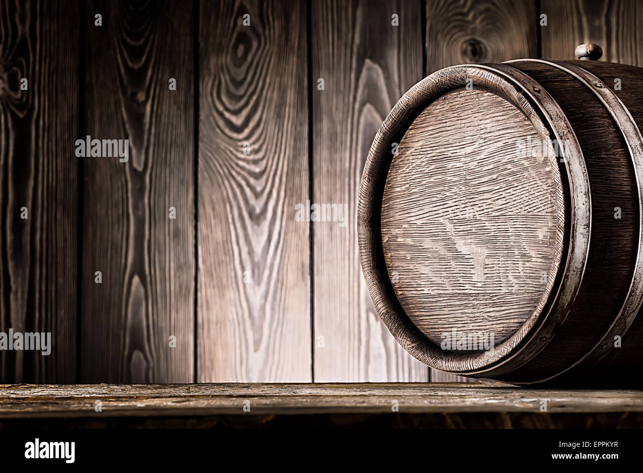 Fragment of old wooden barrels on planks background Stock Photo - Alamy