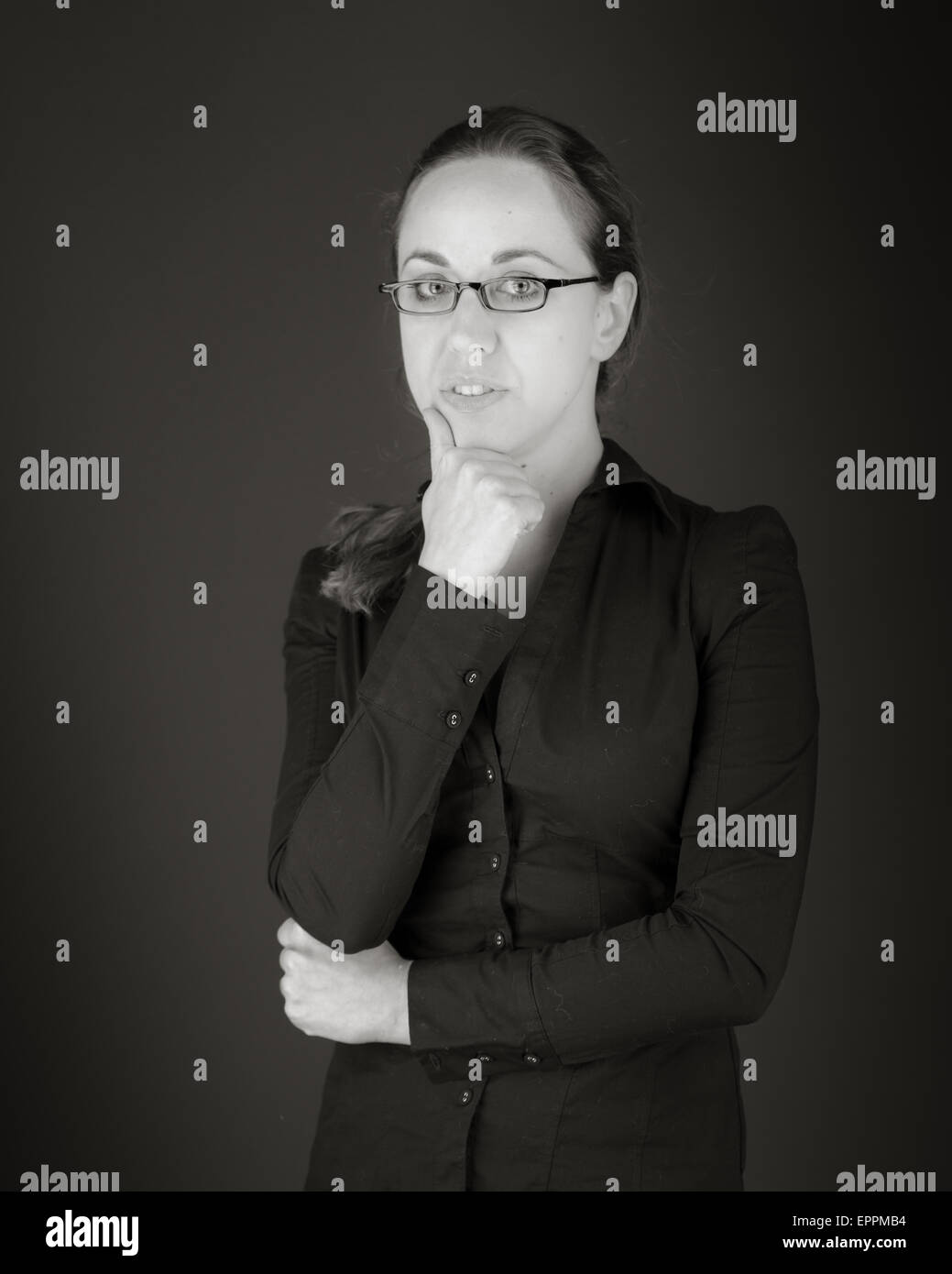 Model in studio isolated on plain grey background Stock Photo - Alamy