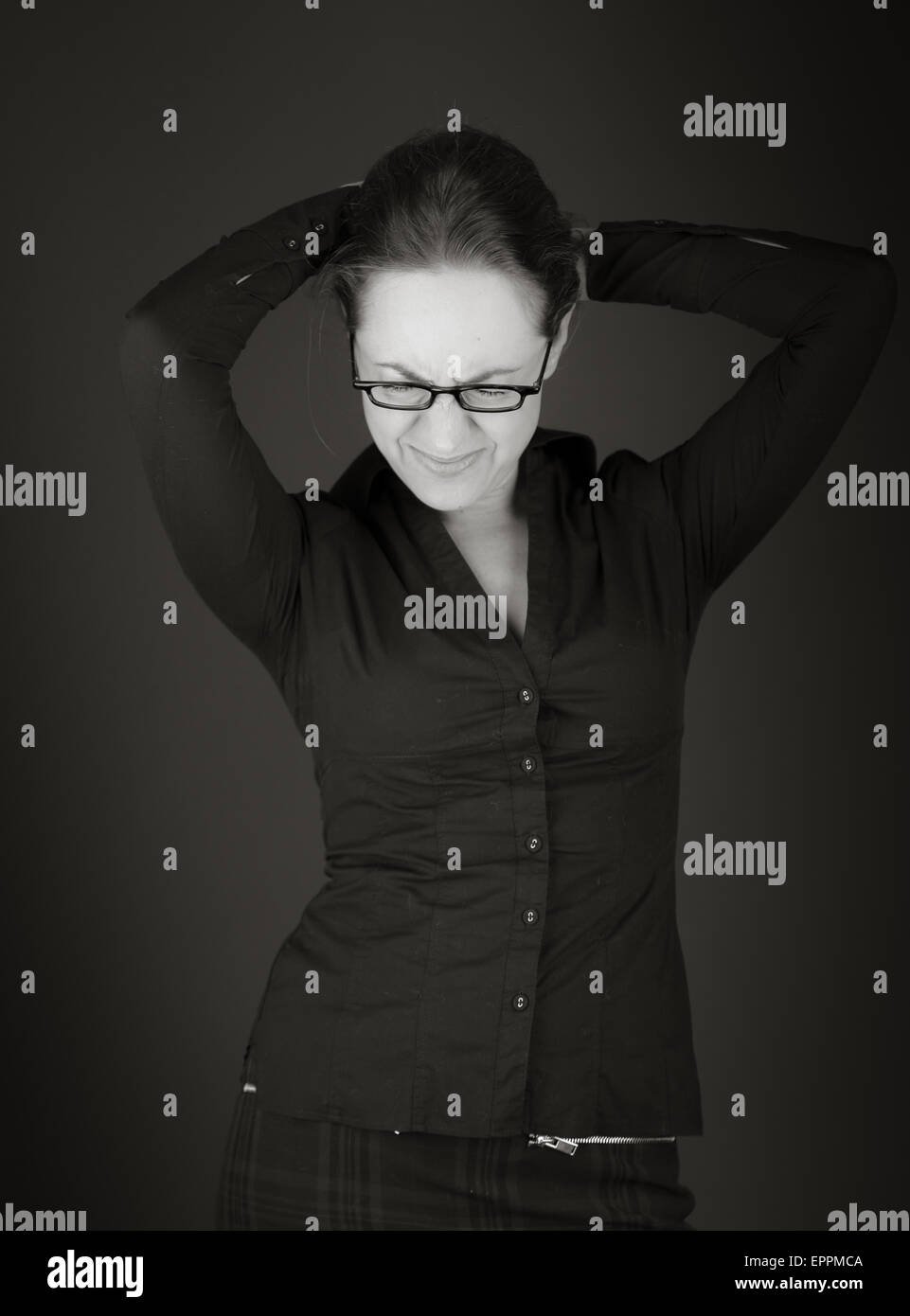 Model in studio isolated on plain grey background Stock Photo - Alamy