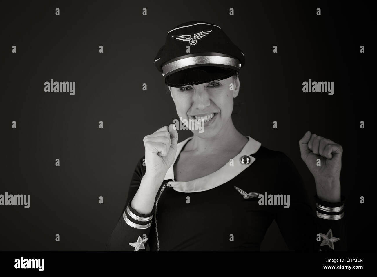 Model in studio isolated on plain grey background Stock Photo - Alamy