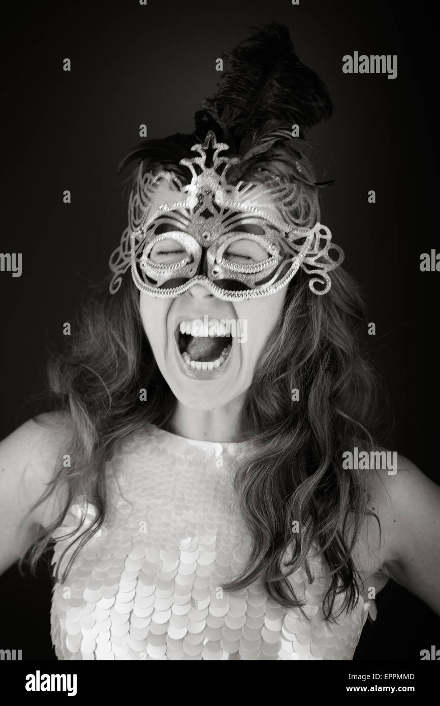 Model in studio isolated on plain grey background Stock Photo - Alamy