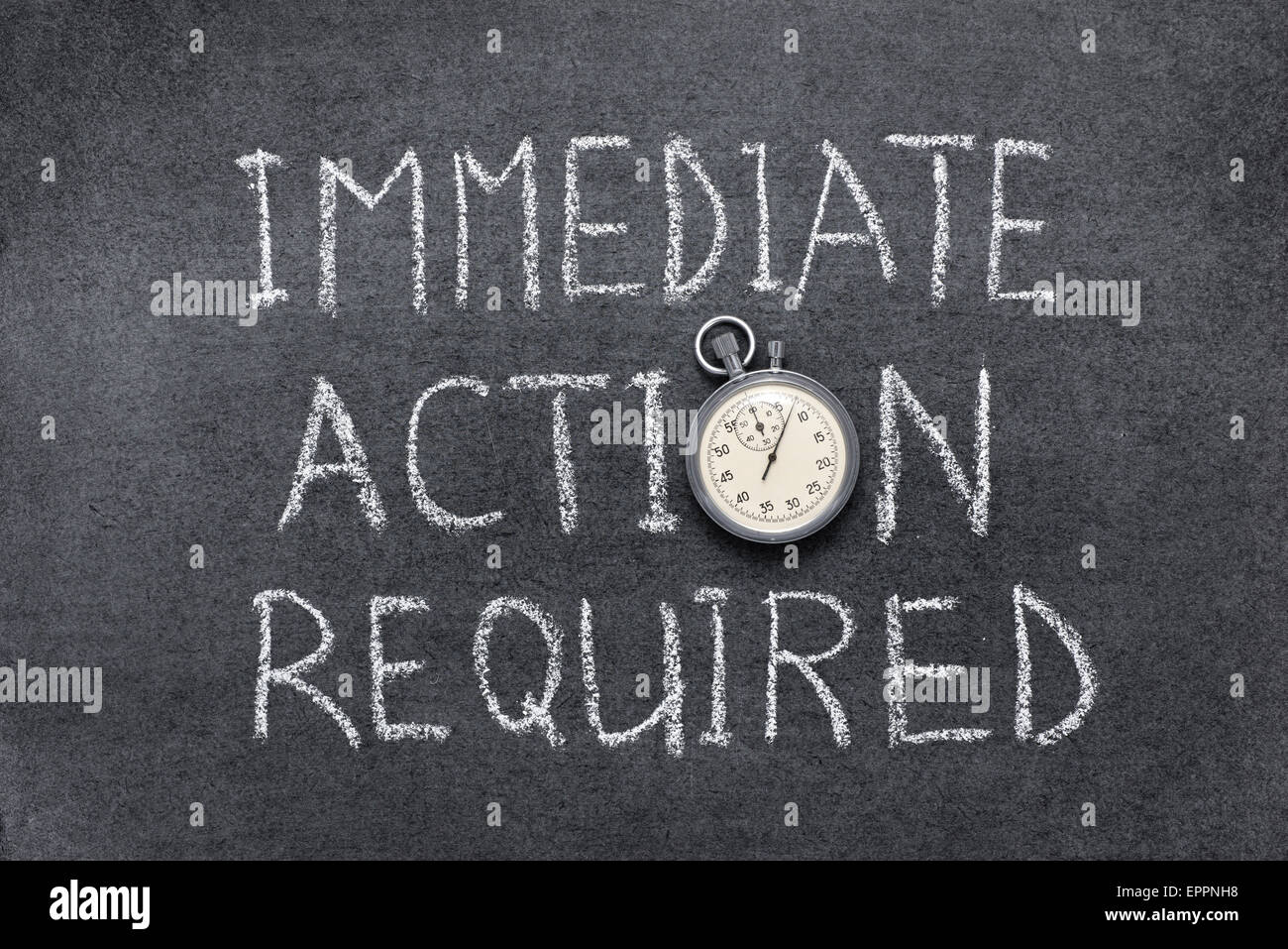 immediate action required phrase handwritten on chalkboard with vintage ...