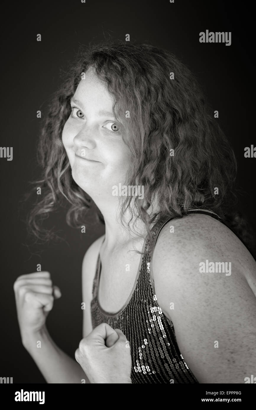 Model in studio isolated on plain grey background Stock Photo - Alamy