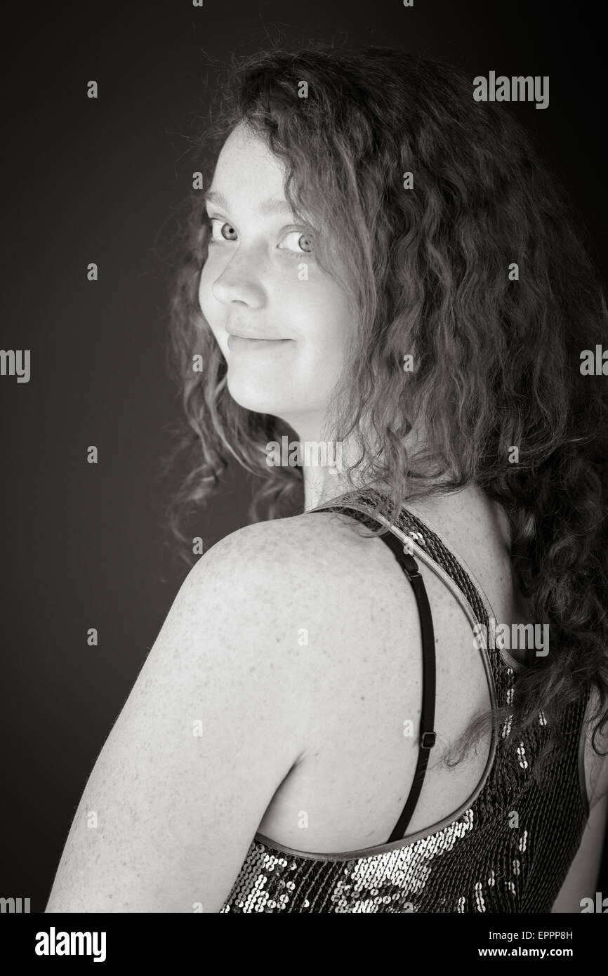 Model in studio isolated on plain grey background Stock Photo - Alamy