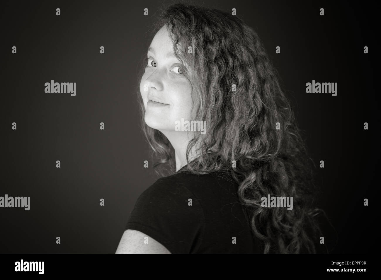 Model in studio isolated on plain grey background Stock Photo - Alamy