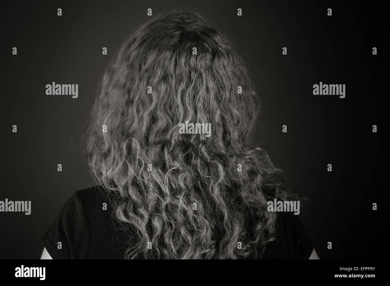 Model in studio isolated on plain grey background Stock Photo - Alamy