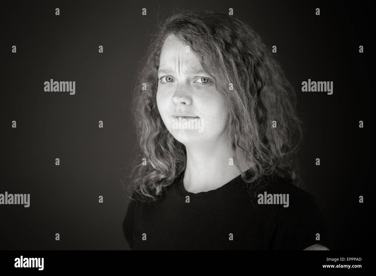 Model in studio isolated on plain grey background Stock Photo - Alamy