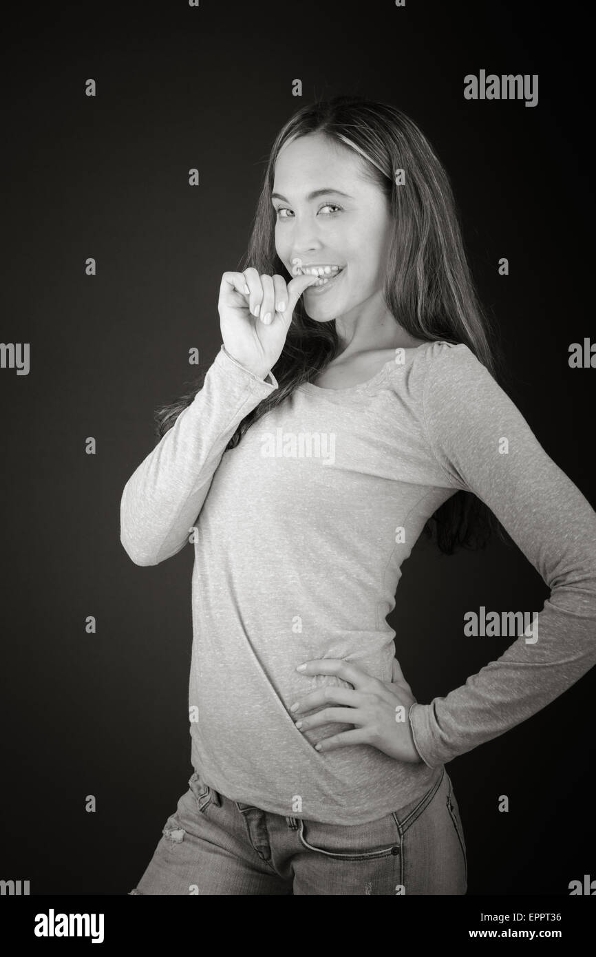 Model in studio isolated on plain grey background Stock Photo - Alamy