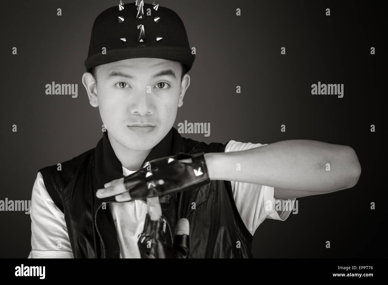 Model in studio isolated on plain grey background Stock Photo - Alamy