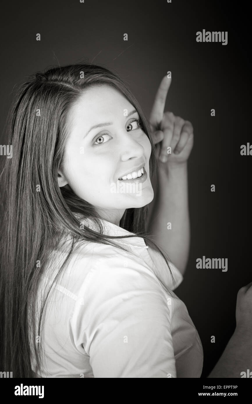 Model in studio isolated on plain grey background Stock Photo - Alamy