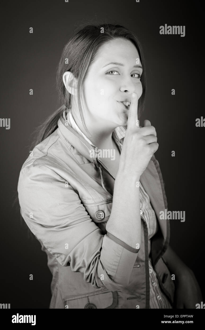 Model in studio isolated on plain grey background Stock Photo - Alamy