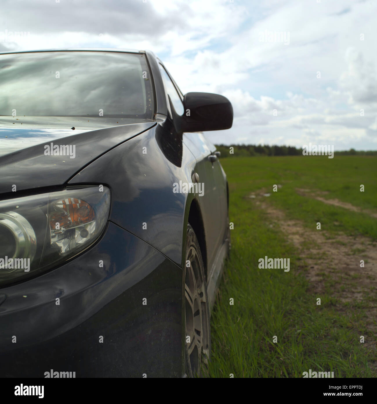Car In A Field Stock Photo - Alamy