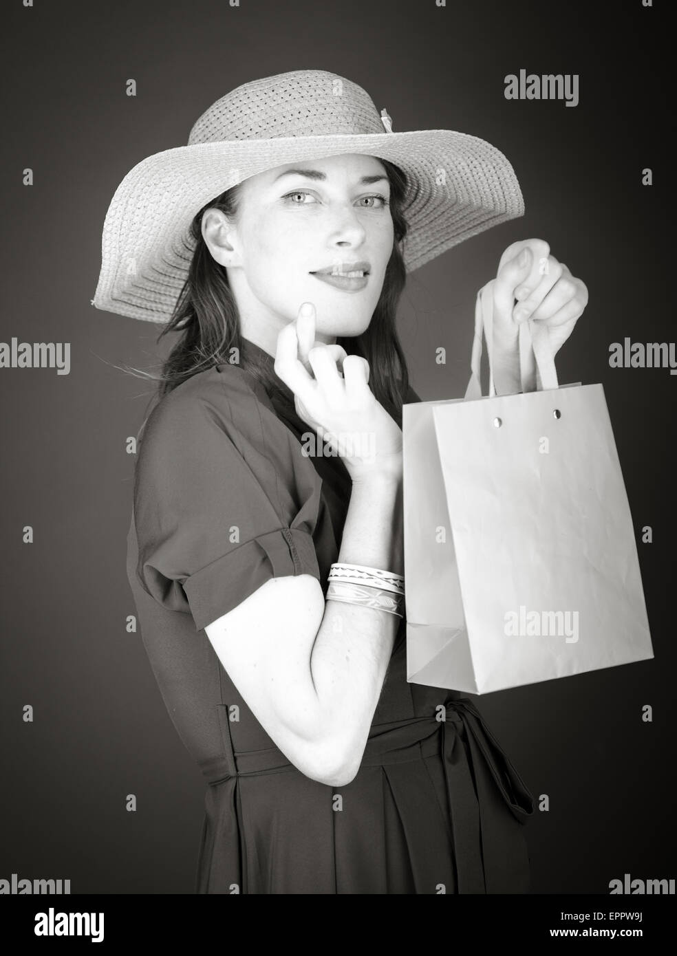 Model in studio isolated on plain grey background Stock Photo - Alamy