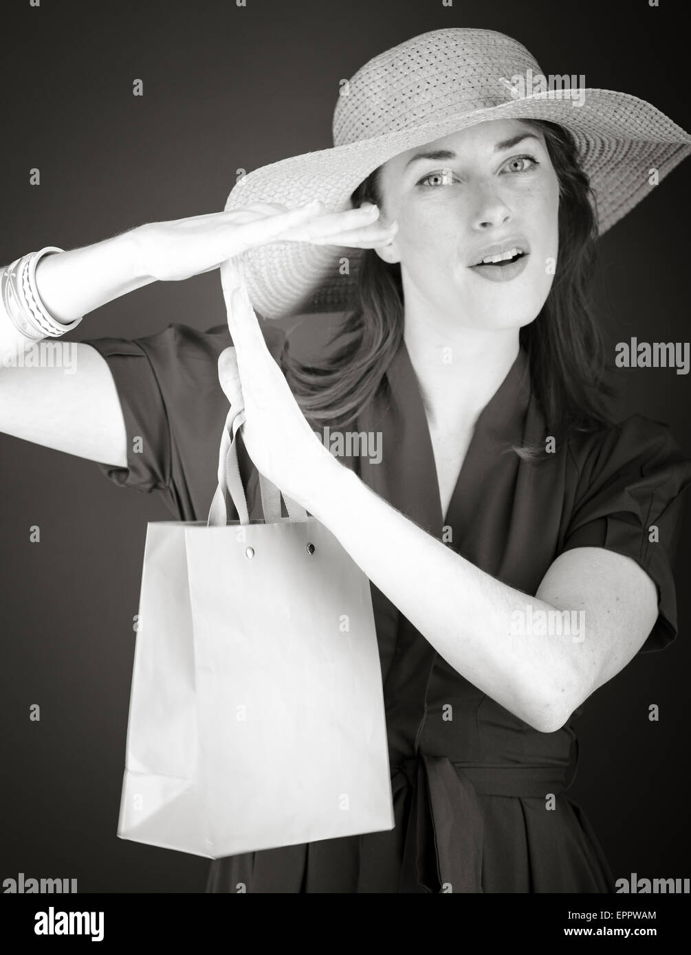 Model in studio isolated on plain grey background Stock Photo - Alamy