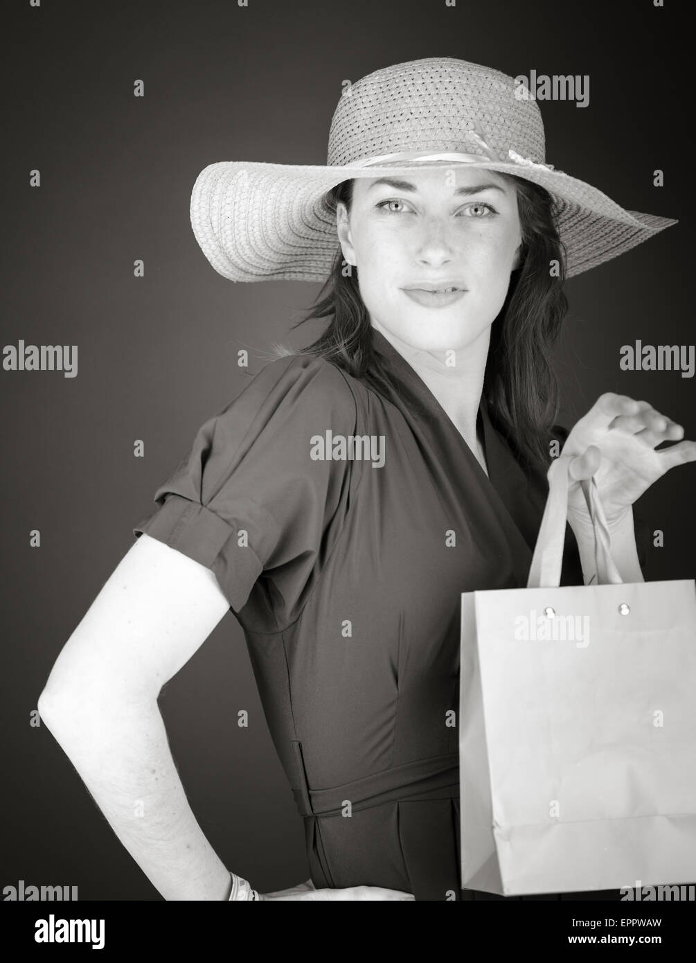 Model in studio isolated on plain grey background Stock Photo - Alamy