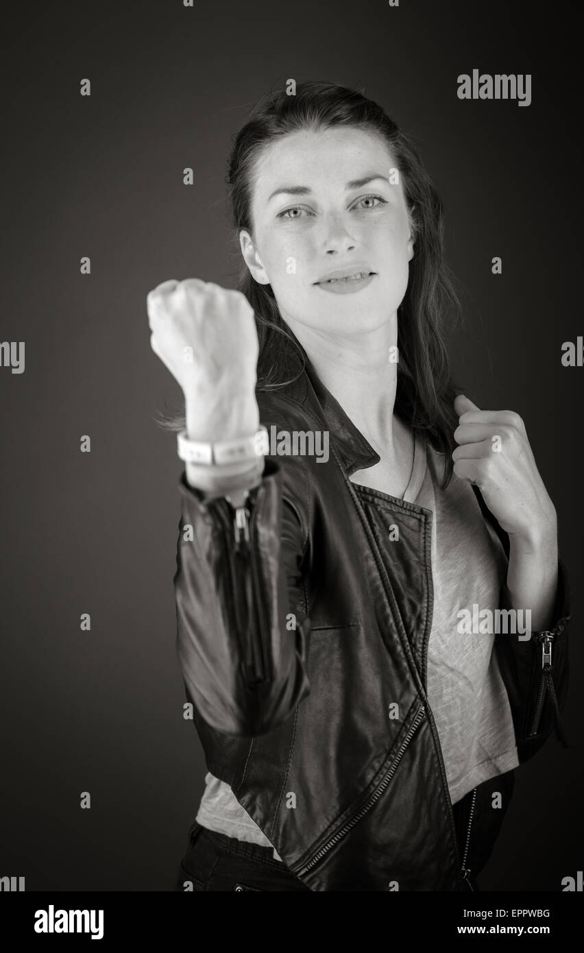 Model in studio isolated on plain grey background Stock Photo - Alamy