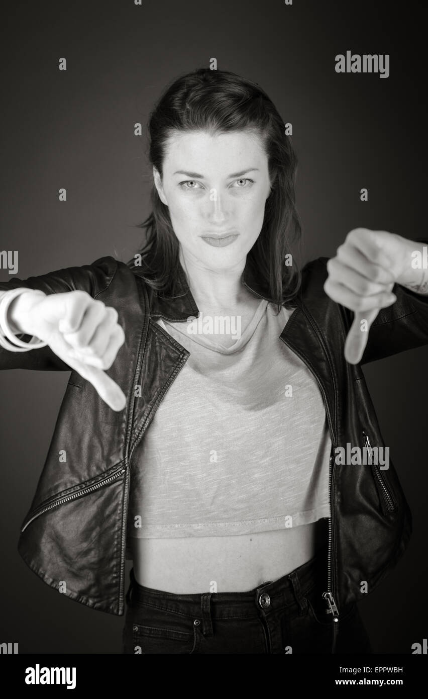 Model in studio isolated on plain grey background Stock Photo - Alamy