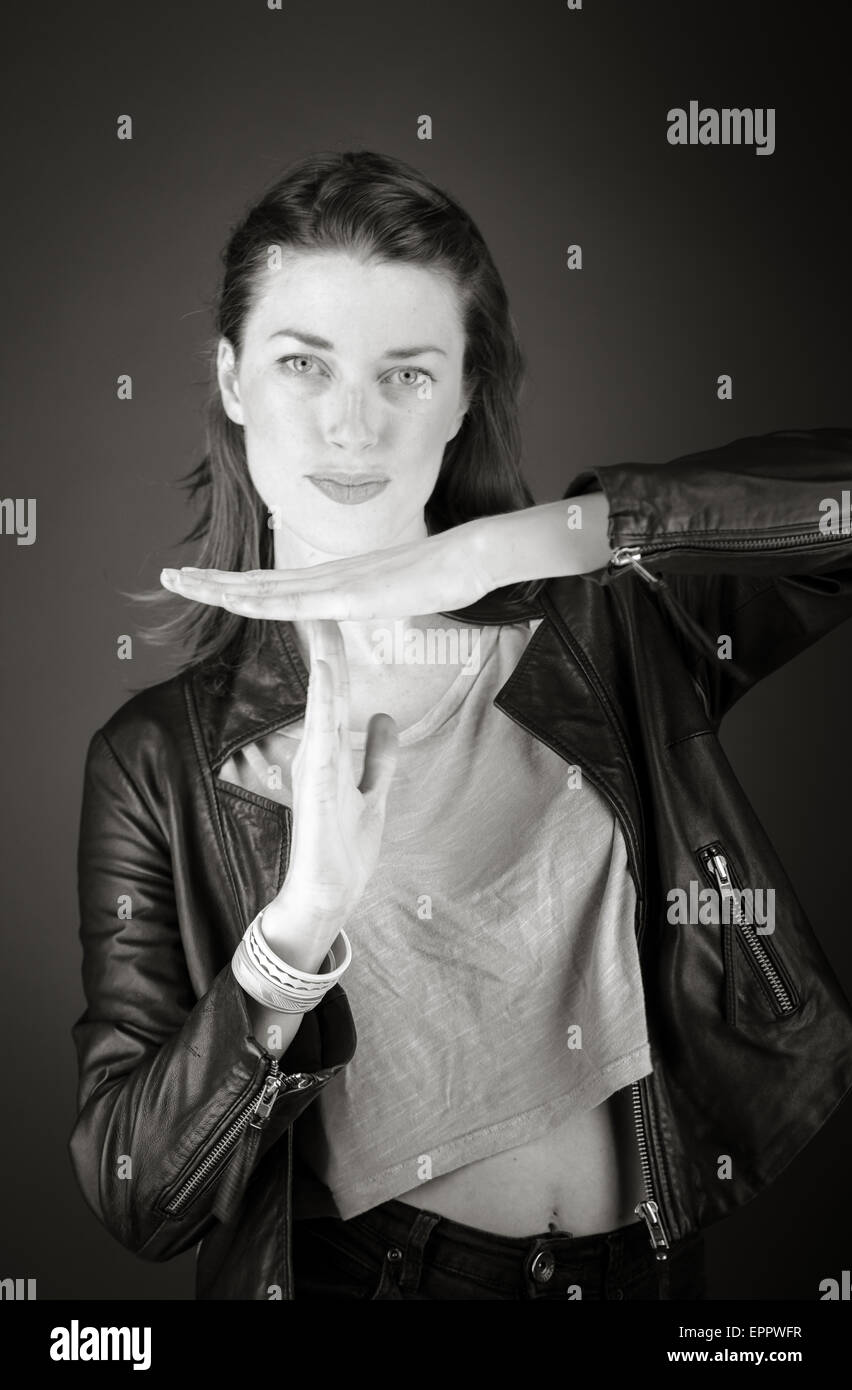 Model in studio isolated on plain grey background Stock Photo - Alamy