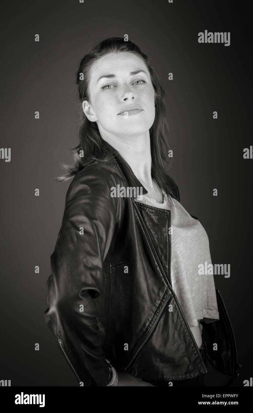 Model in studio isolated on plain grey background Stock Photo - Alamy