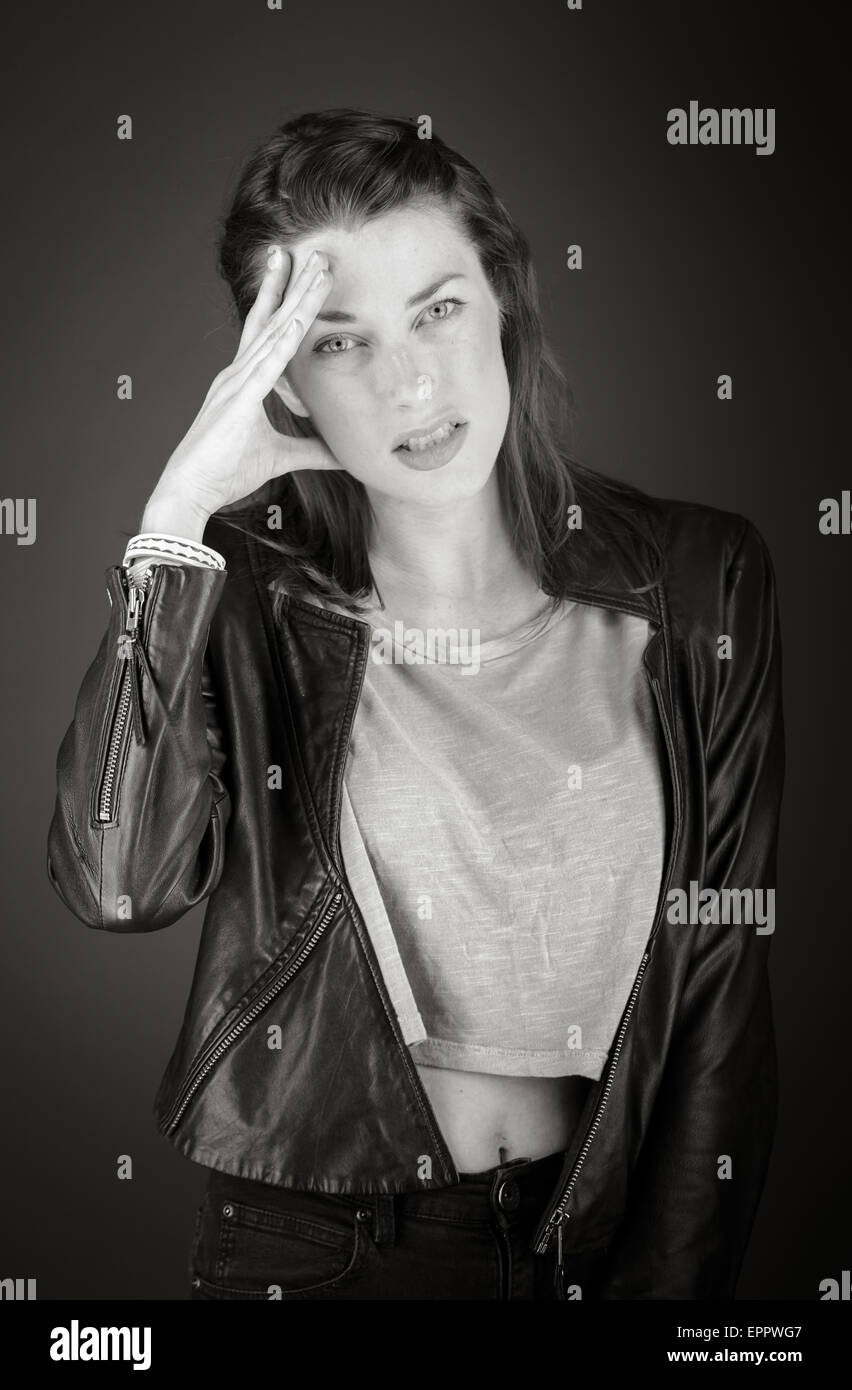 Model in studio isolated on plain grey background Stock Photo - Alamy