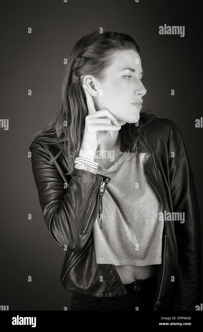 Model in studio isolated on plain grey background Stock Photo - Alamy