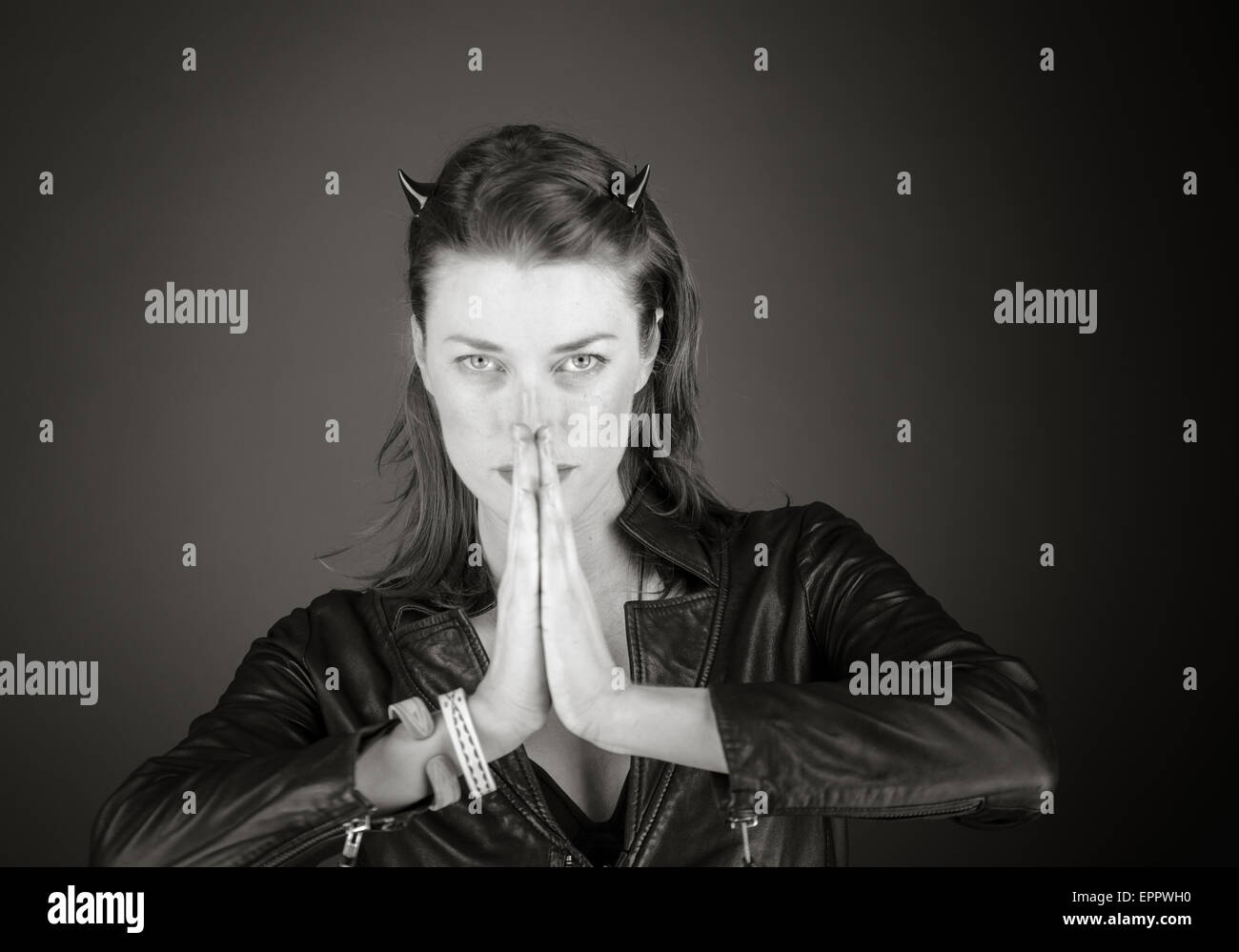 Model in studio isolated on plain grey background Stock Photo - Alamy