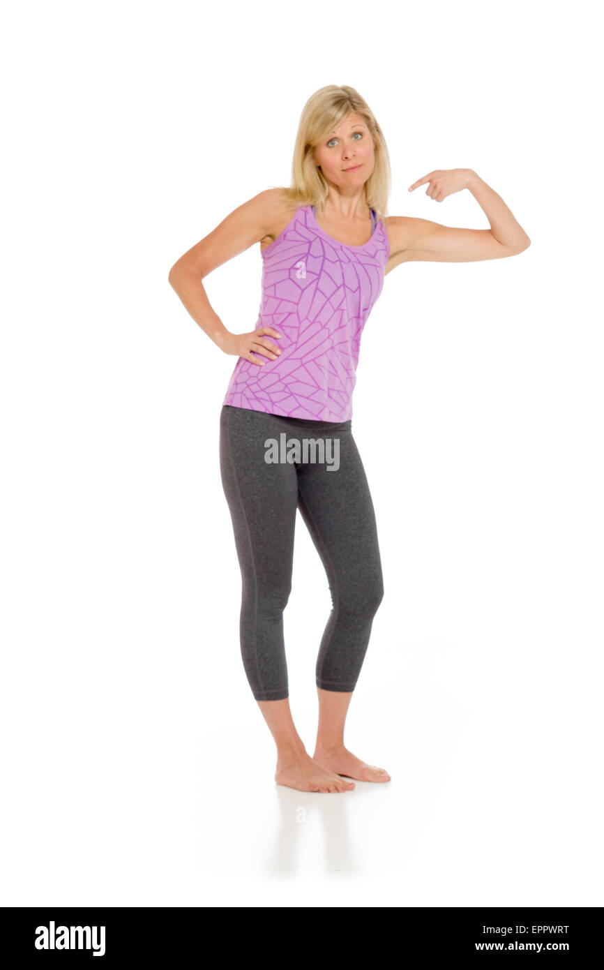 Model isolated on plain background in studio pointing Stock Photo - Alamy