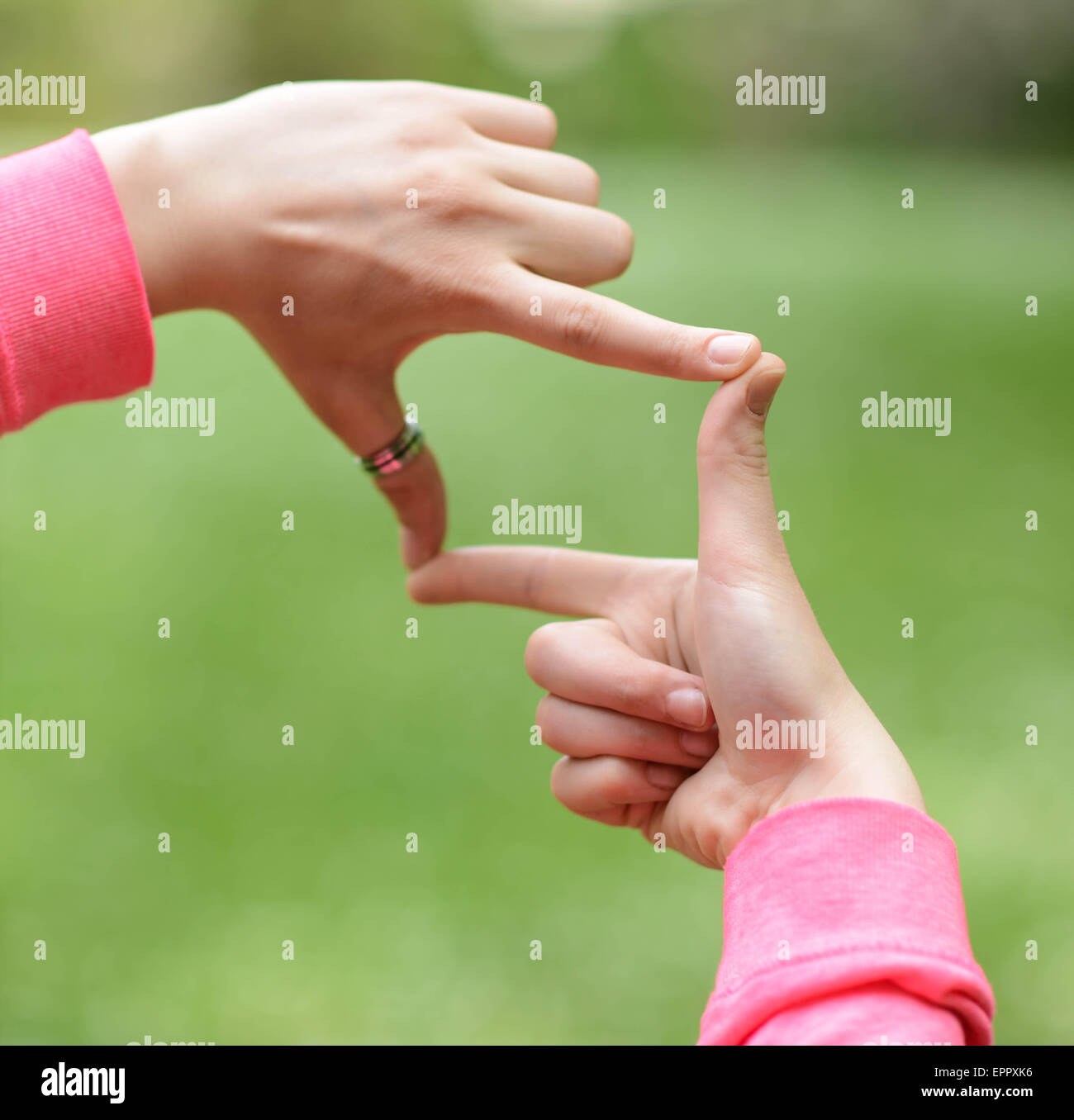 Close up hands frame hi-res stock photography and images - Alamy