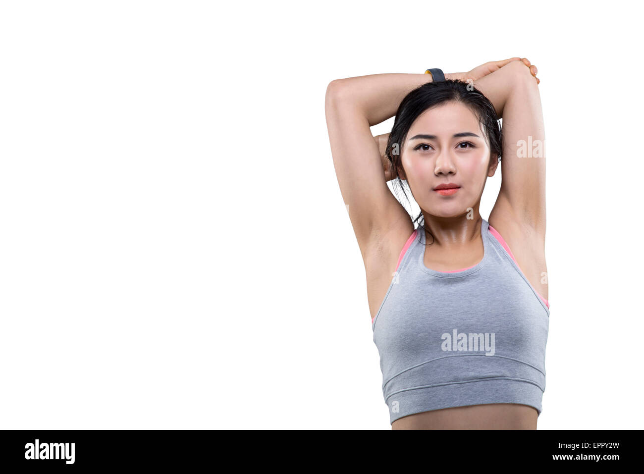 Female athlete stretching shoulders Stock Photo - Alamy