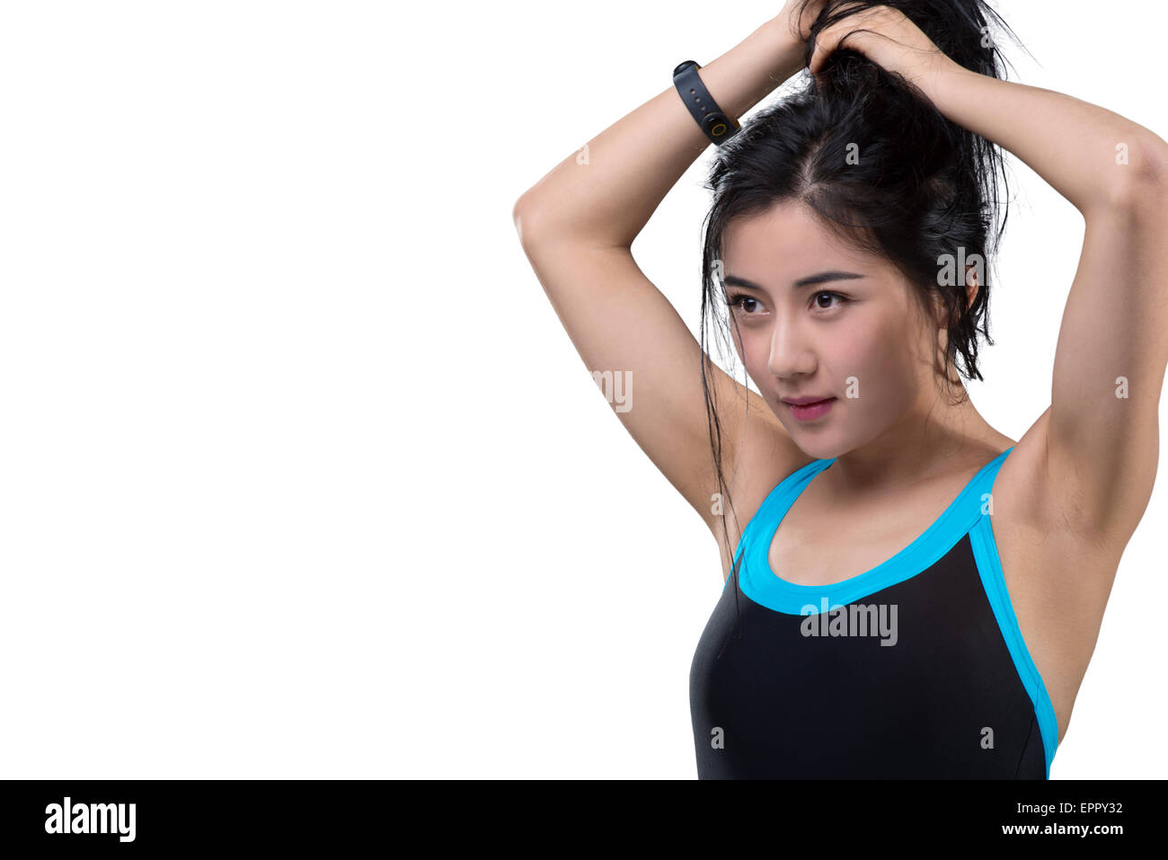 Female swimmer running fingers through hair Stock Photo - Alamy