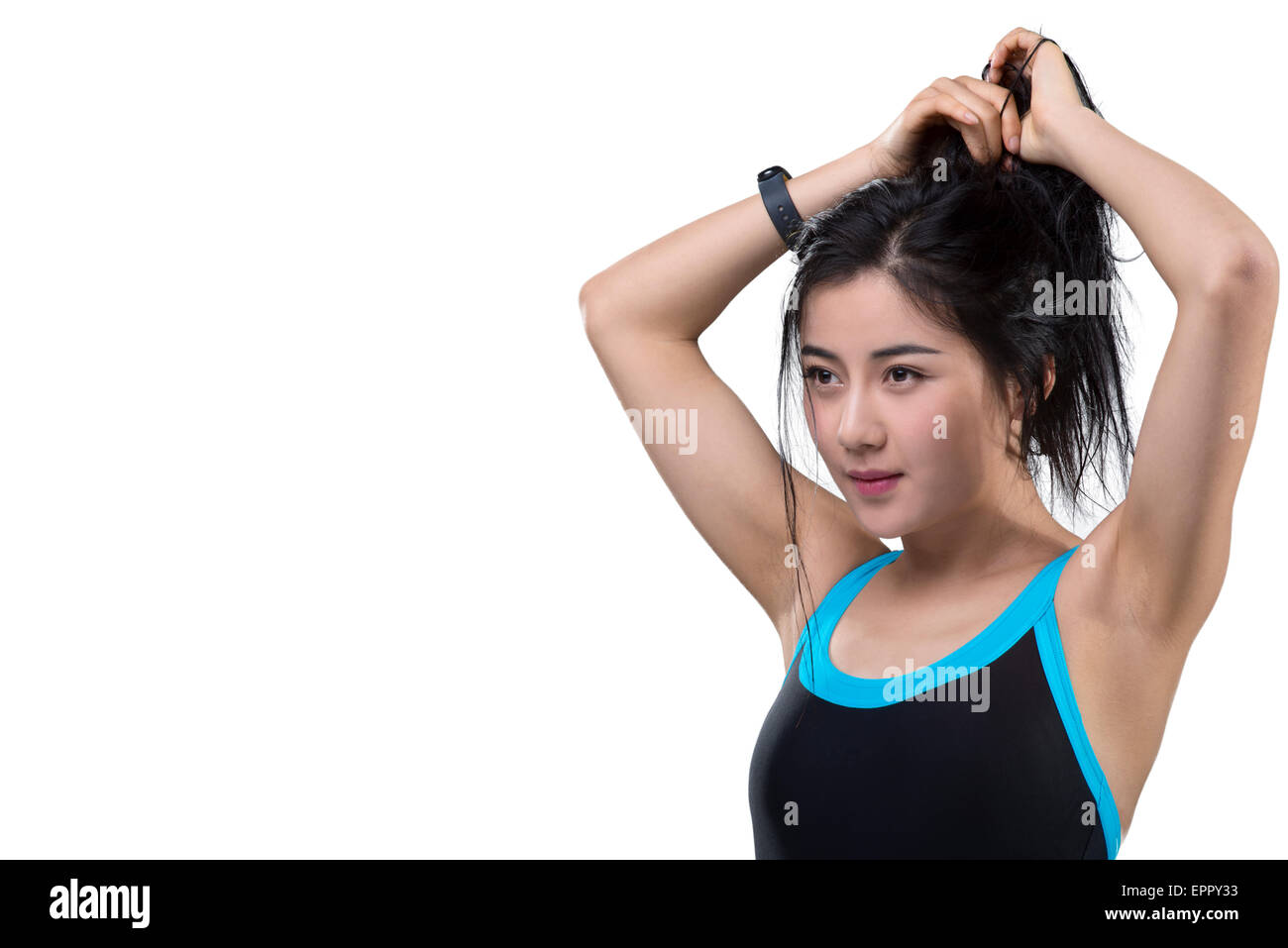 Female swimmer running fingers through hair Stock Photo - Alamy