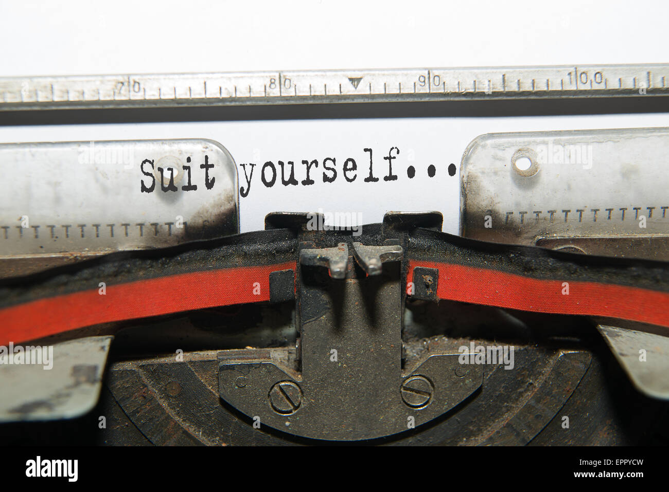 Sheet of paper with the inscription "Suit yourself" in the typewriter ...