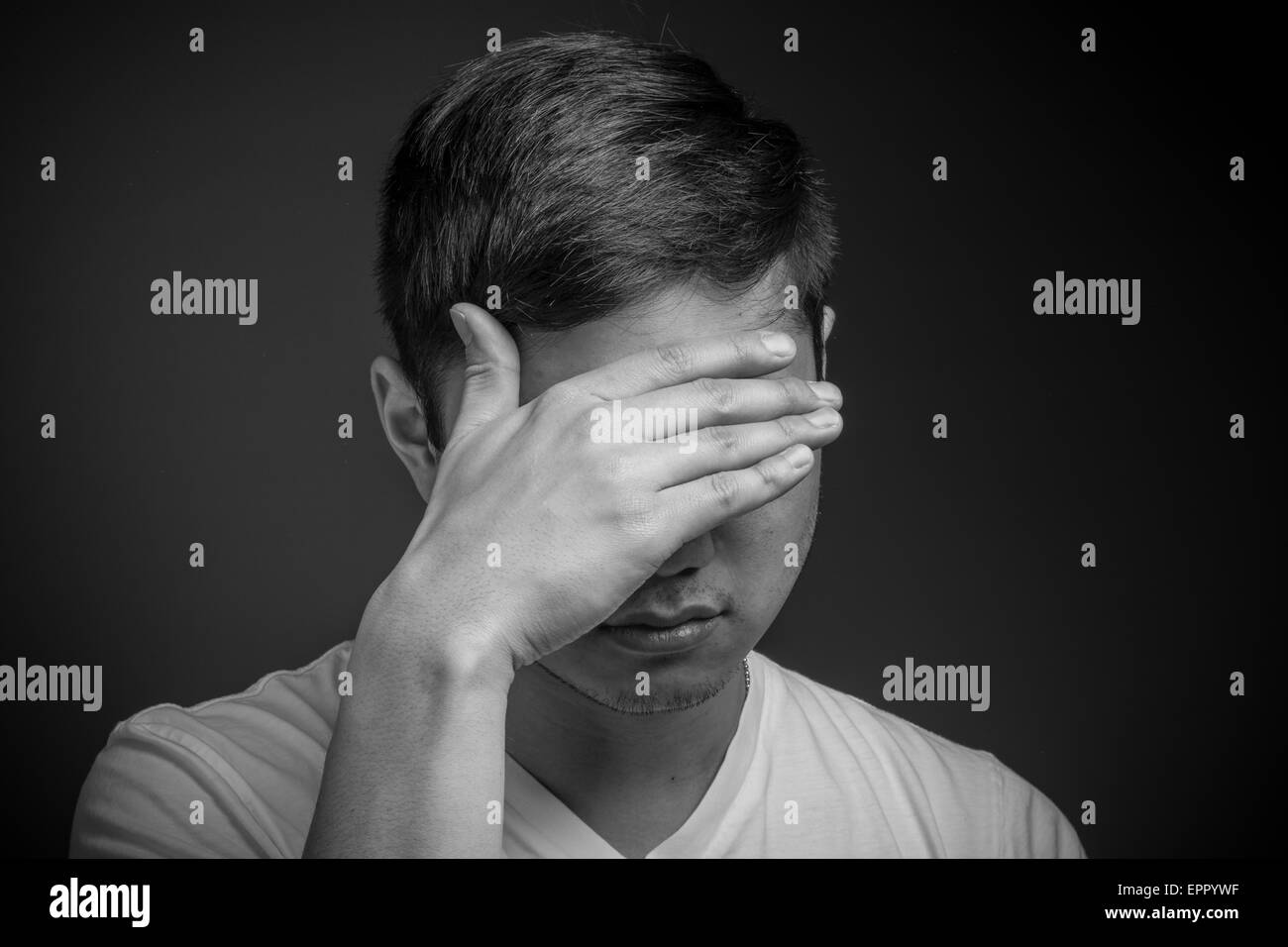 Model hiding face shame Stock Photo - Alamy