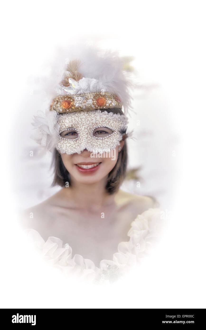 Venetian mask. Woman with a white vignette background Stock Photo - Alamy