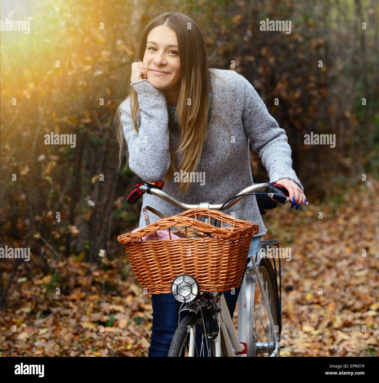 Beautiful woman enjoying nature driving bicycle Stock Photo - Alamy