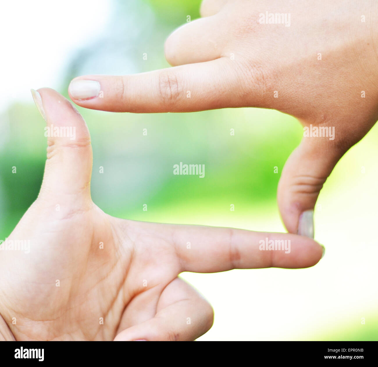 Close up of hands making frame gesture Stock Photo - Alamy