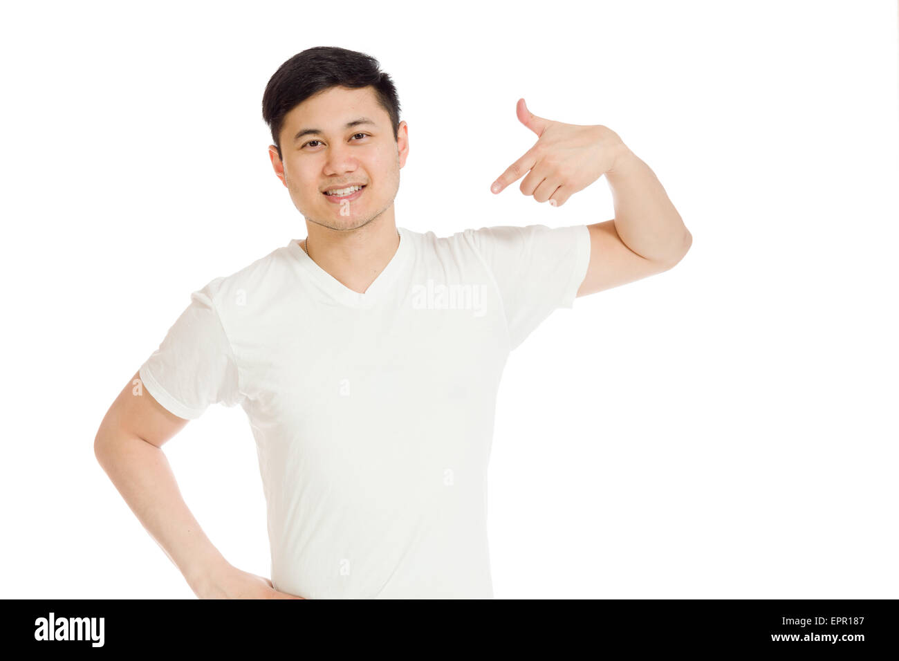 Model isolated on plain background in studio pointing Stock Photo - Alamy